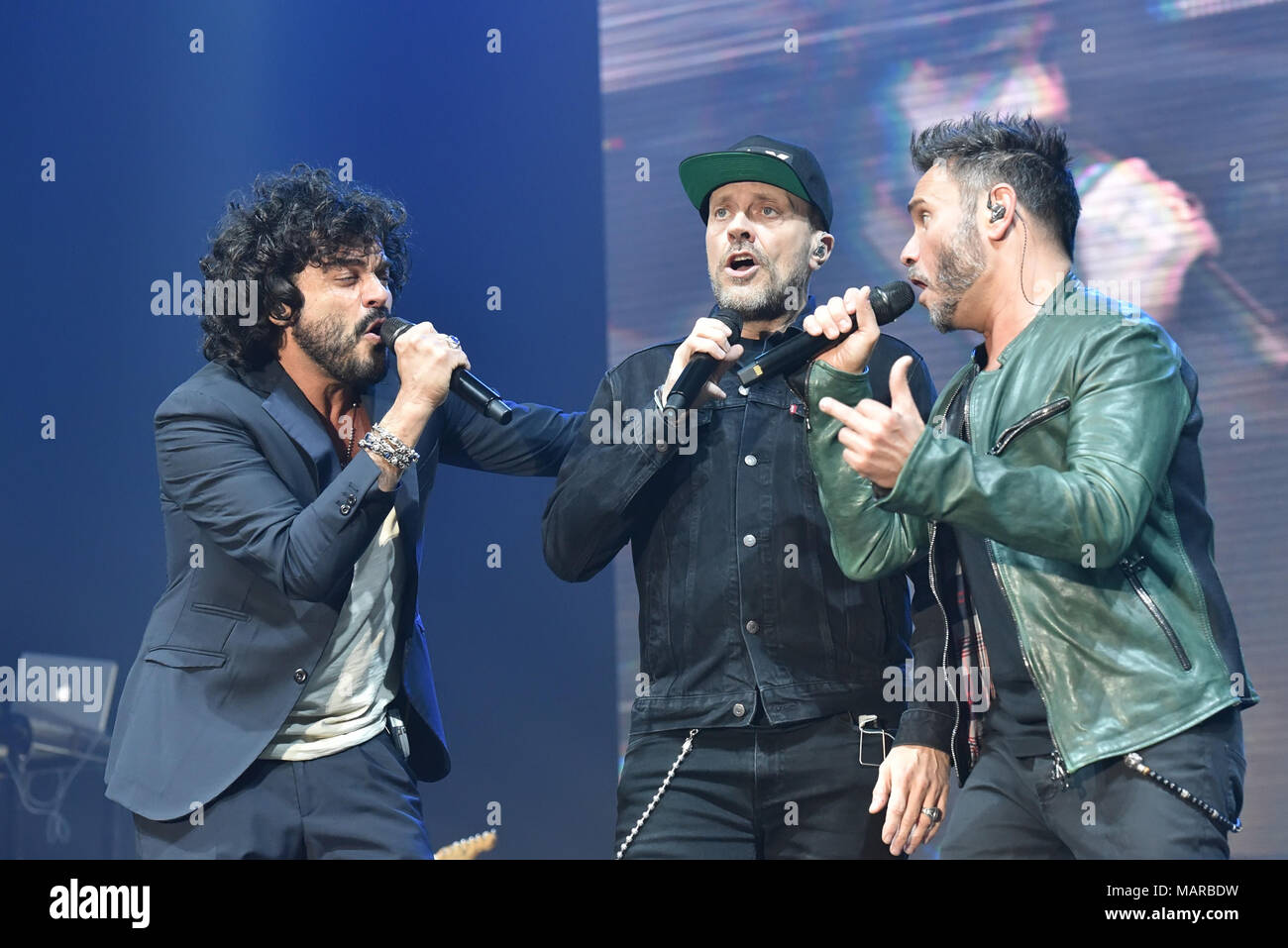 The Italian pop singers trio, composed by Max Pezzali (C), former ...