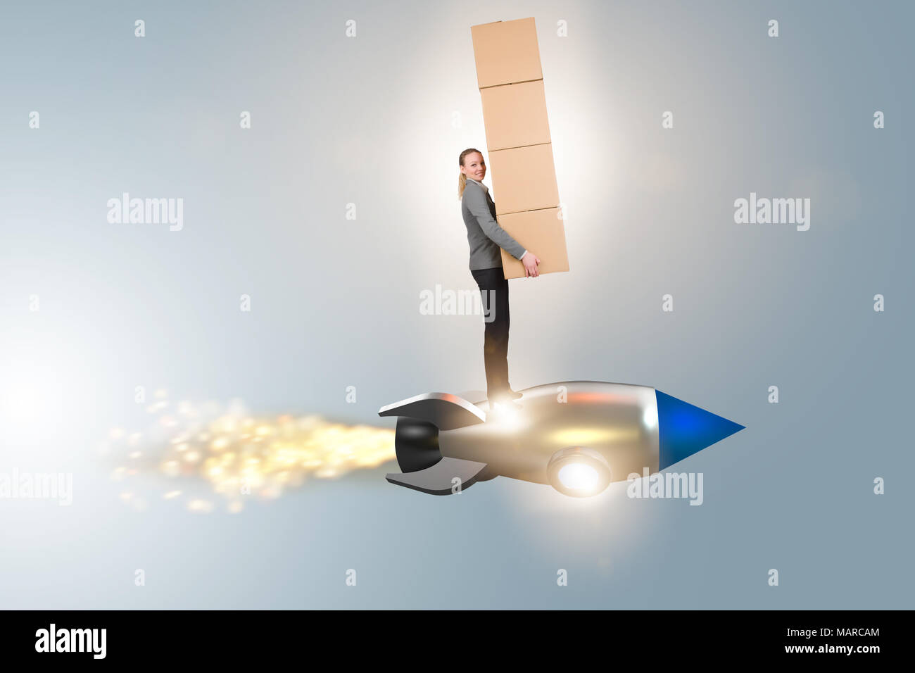 Woman flying rocket and delivering boxes Stock Photo - Alamy