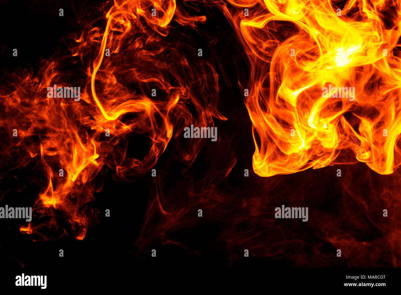 Fire flames background. Dense fiery smoke on a black isolated ...
