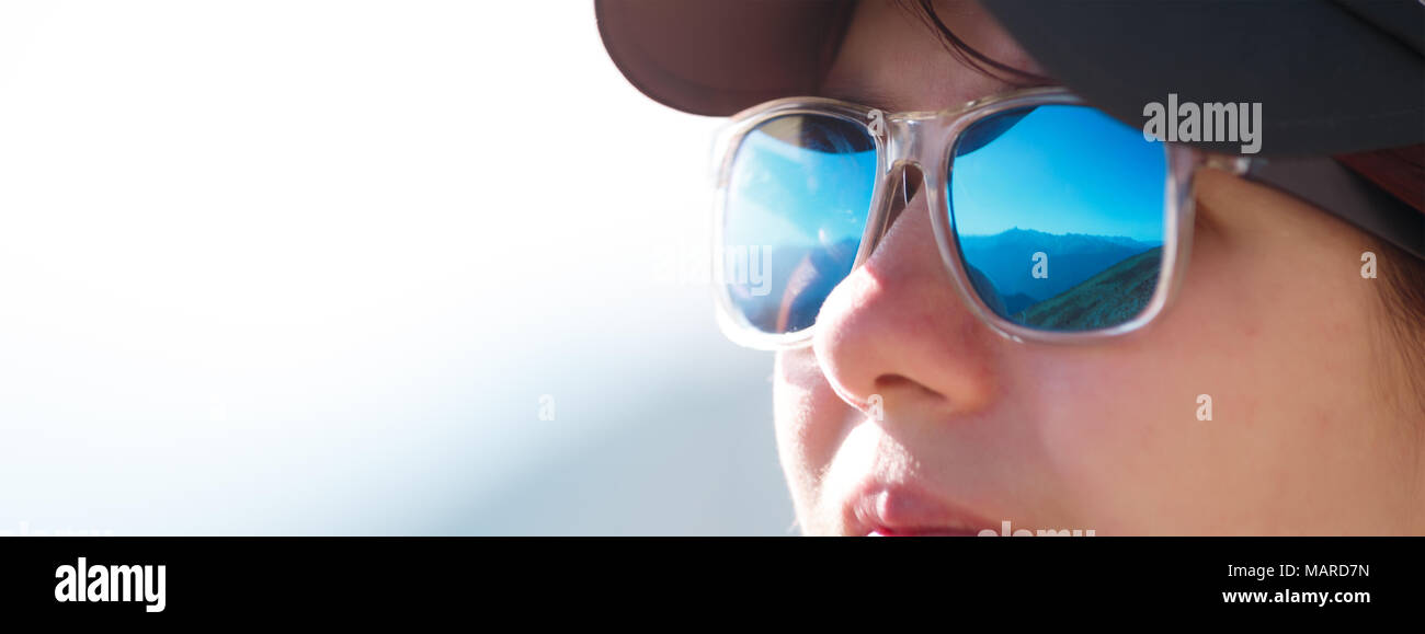 Panoramic photo of girl's face in sunglasses Stock Photo - Alamy