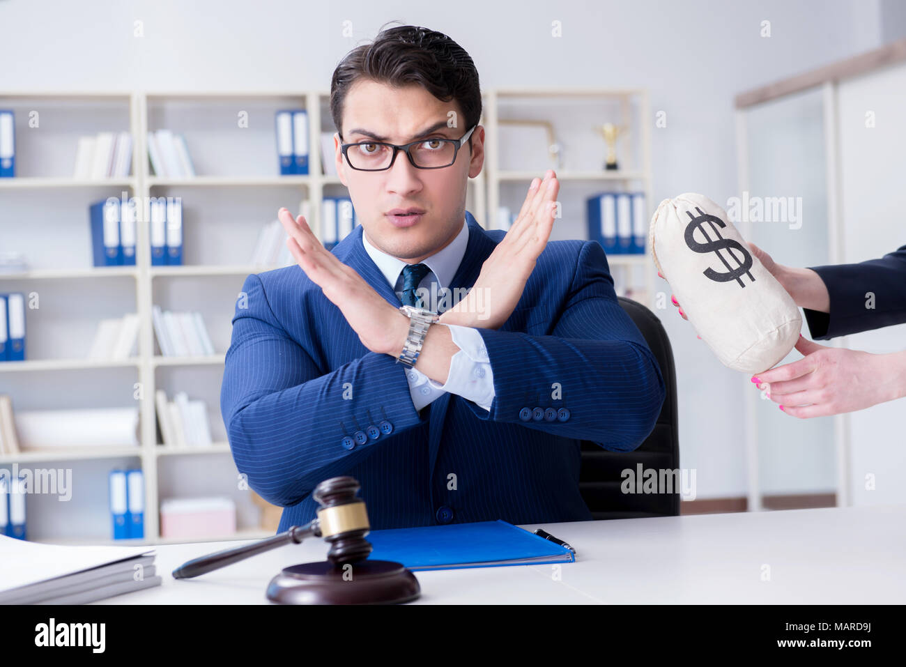 Judge in bribe concept with money Stock Photo - Alamy