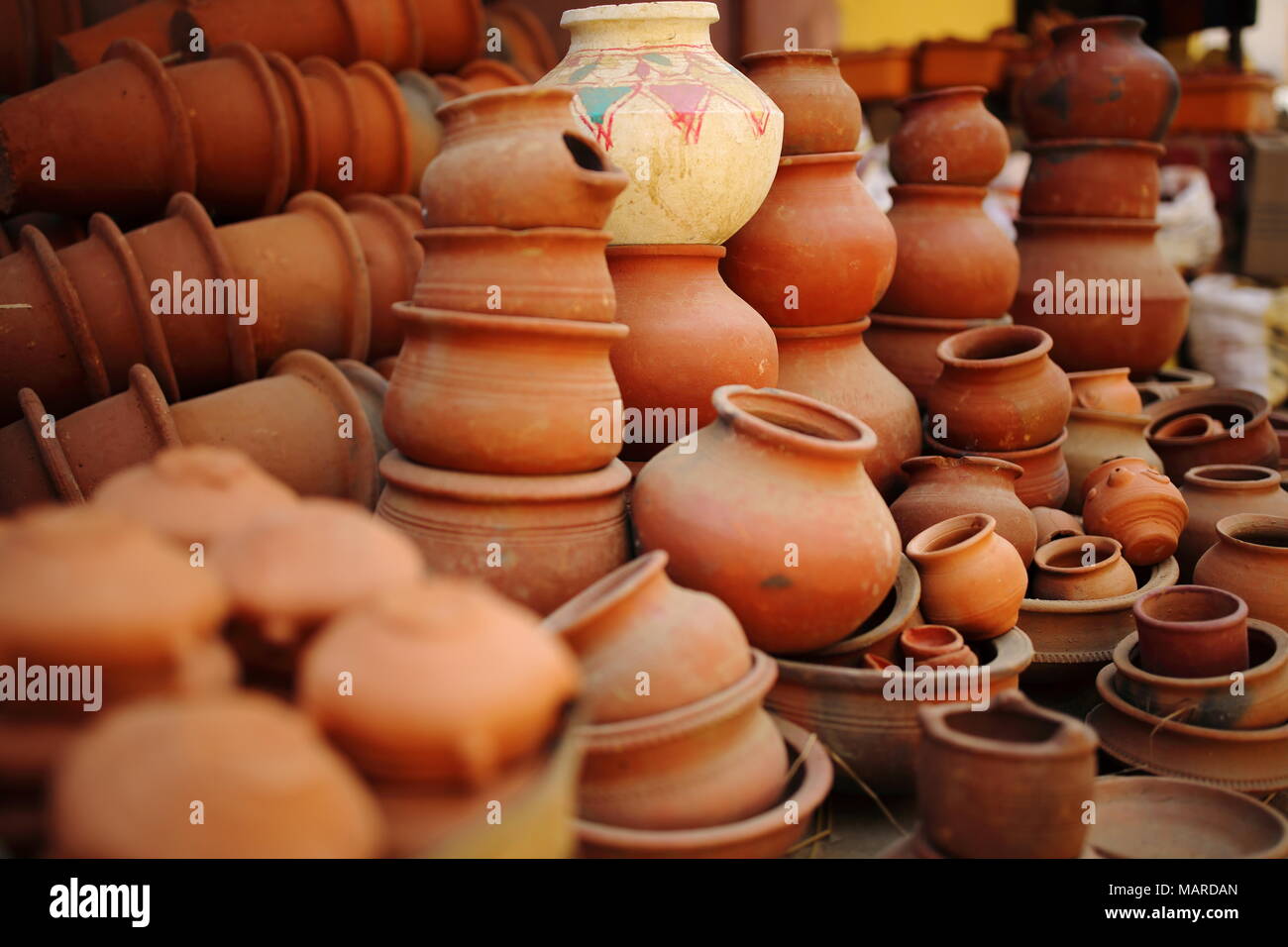 Variety of earthenware made out of clay using traditional method Stock ...