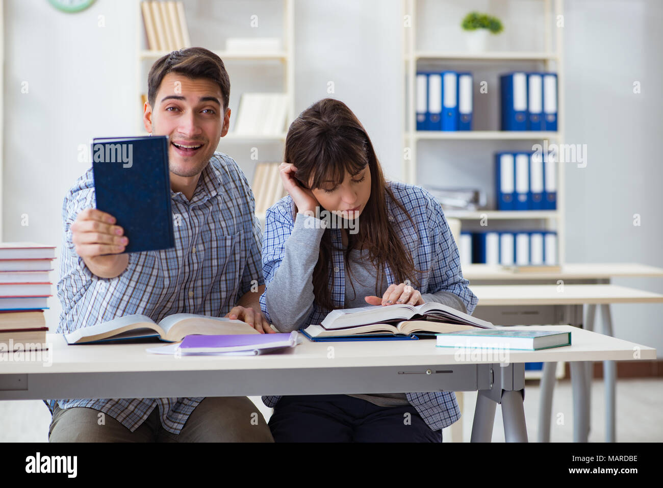 Students sitting and studying in classroom college Stock Photo - Alamy