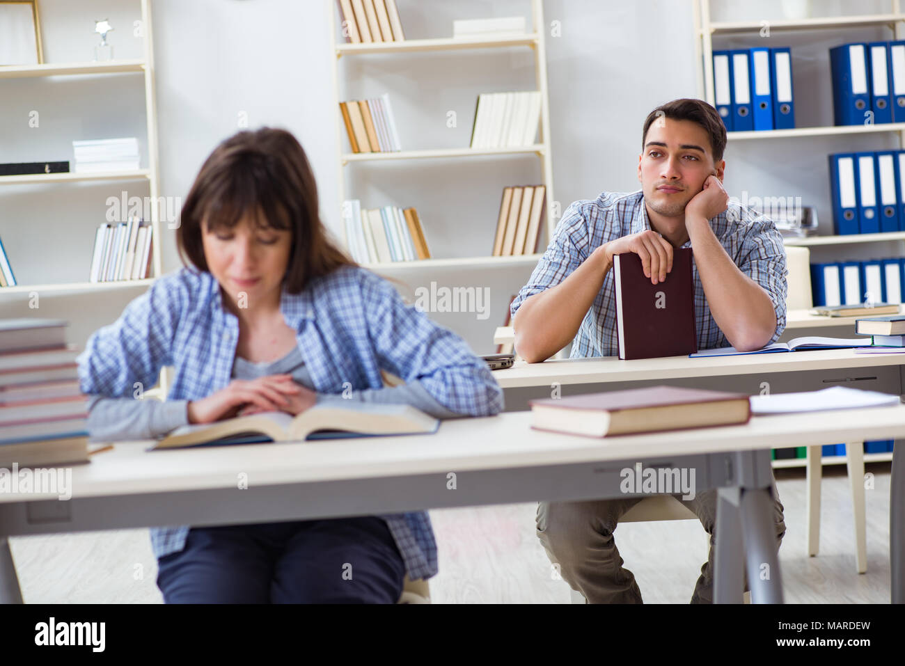 Students sitting and studying in classroom college Stock Photo - Alamy