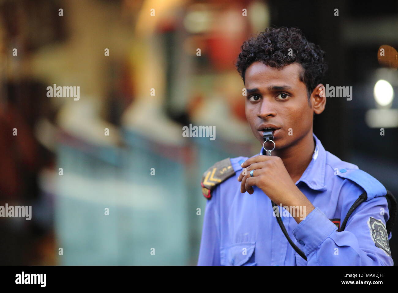 Indian security guard parking lot in hi-res stock photography and ...