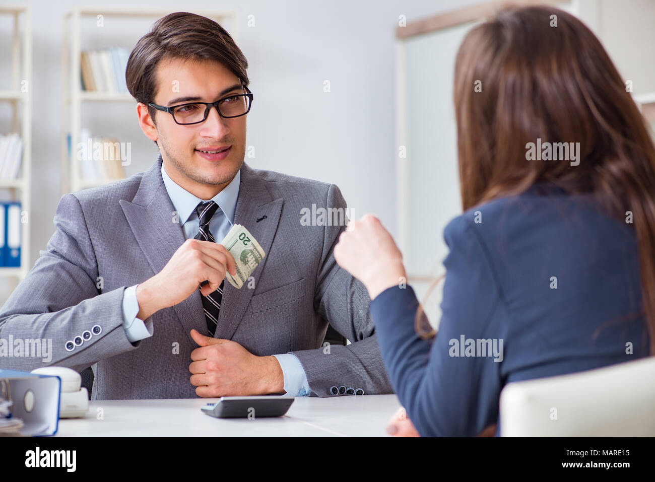 Woman offering bribe businessman hi-res stock photography and images ...