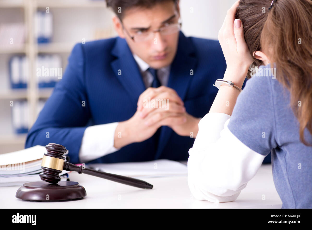 Lawyer talking to his client in office Stock Photo - Alamy