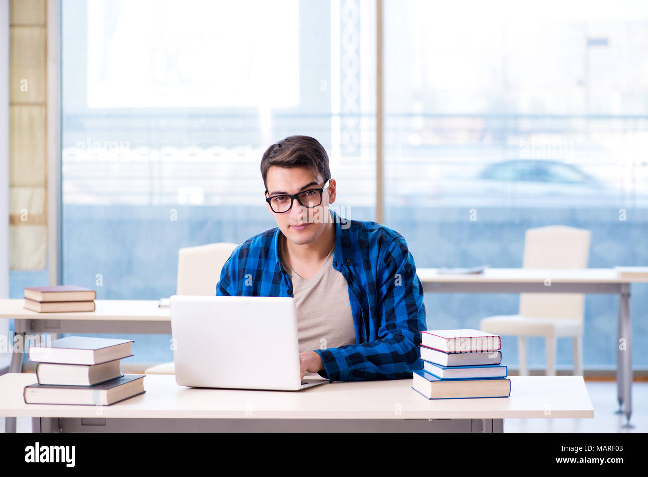 Student in telelearning distance learning concept reading in library ...