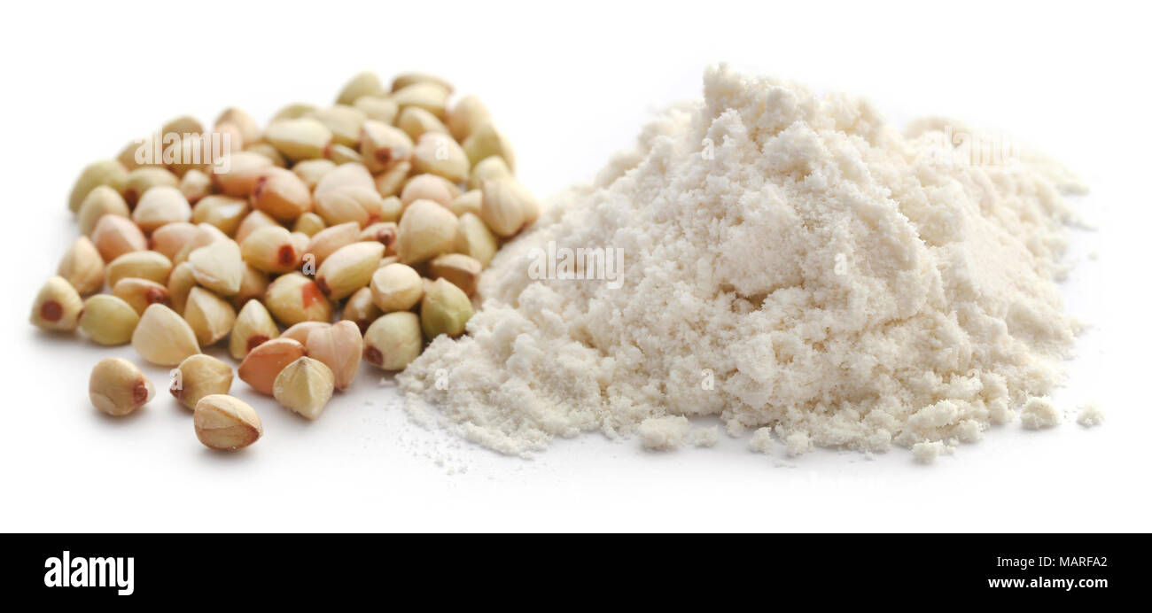 Buckwheat with flour over white background Stock Photo - Alamy