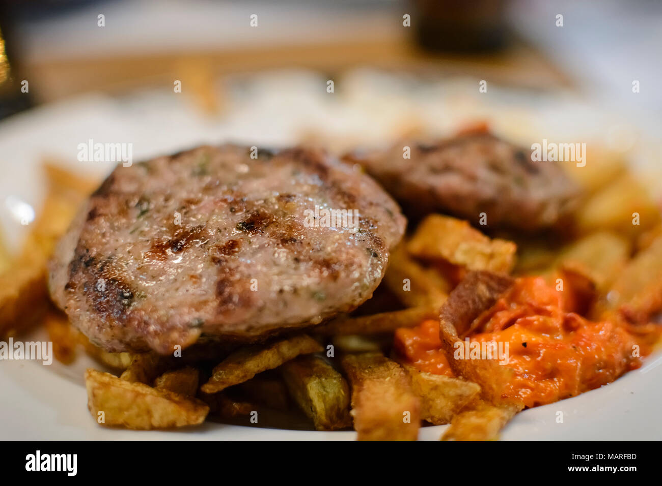 bulgaria traditional meat ball kufte with french fries and lutenitsa ...