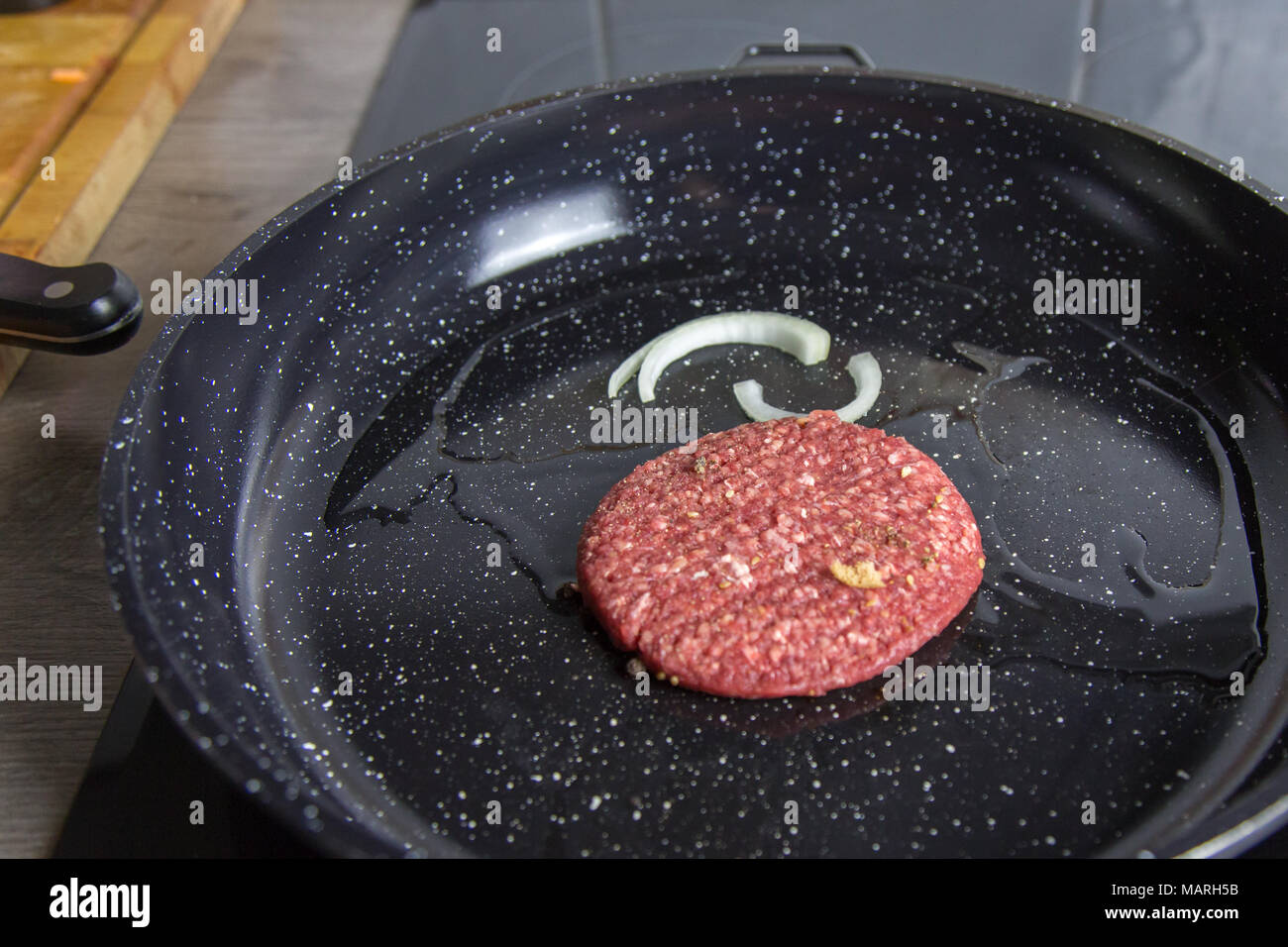Doing a Hamburger at Home Stock Photo - Alamy