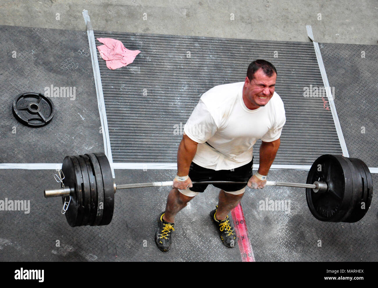 A contestant deadlifts during a strongman competition in Eau Claire ...