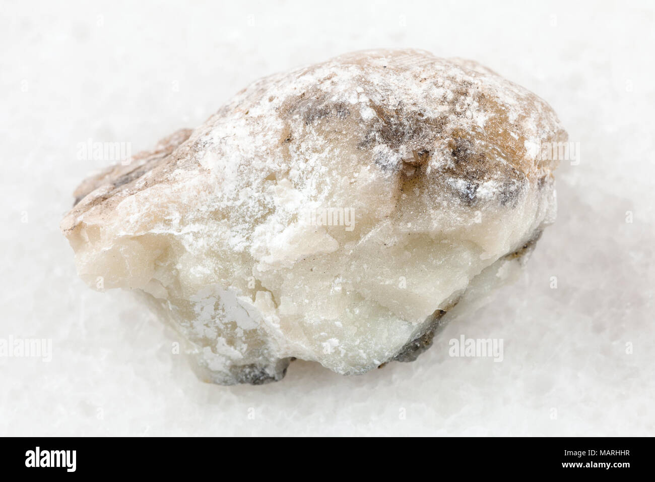 macro shooting of natural mineral rock specimen - raw talc stone on ...