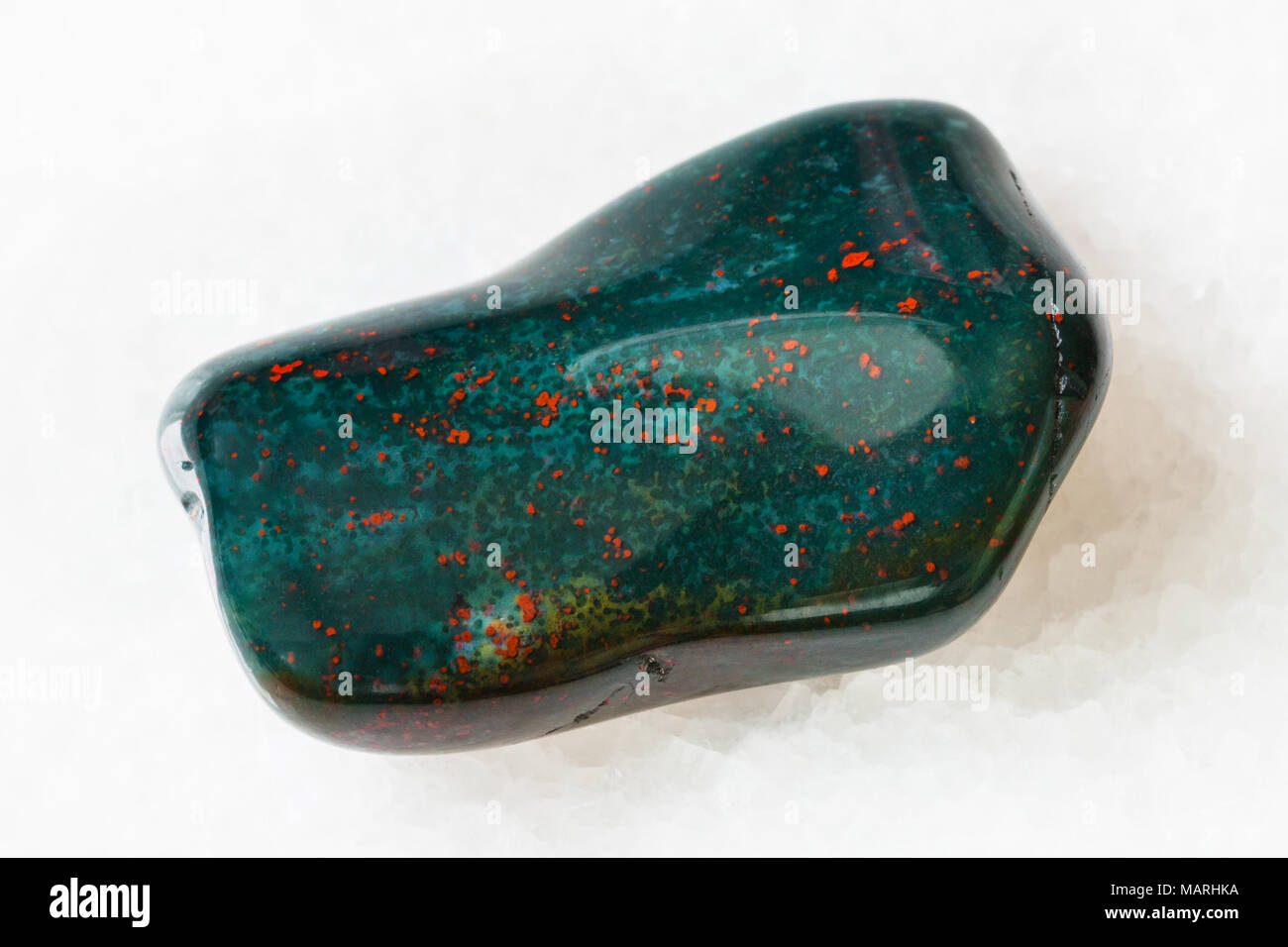 macro shooting of natural mineral rock specimen - polished green ...