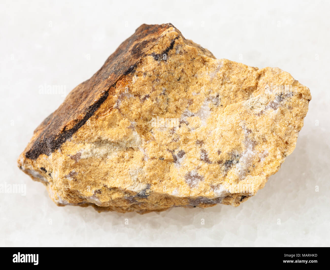 macro shooting of natural mineral rock specimen - raw Narsarsukite ...