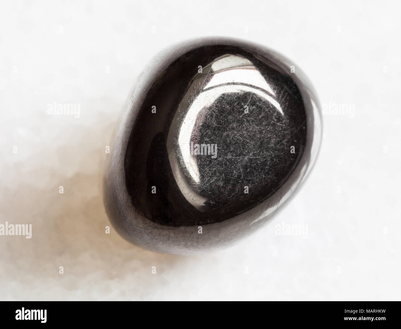 macro shooting of natural mineral rock specimen - polished Gagate (Jet ...