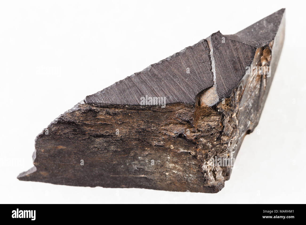 macro shooting of natural mineral rock specimen - raw Gagate (Jet ...