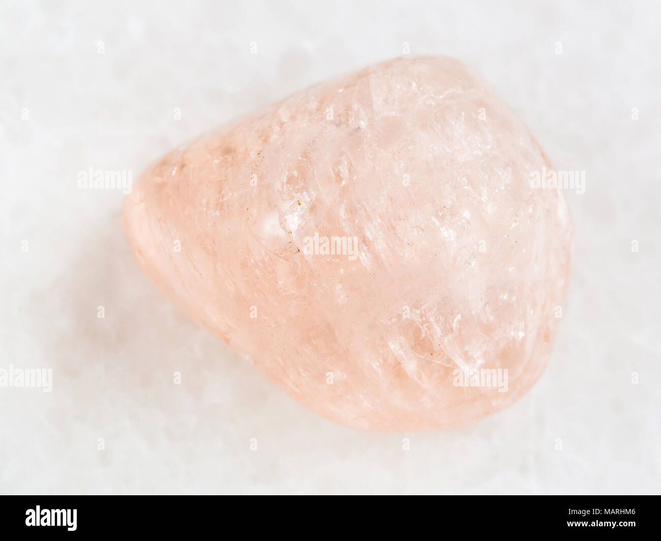 macro shooting of natural mineral rock specimen - tumbled morganite ...