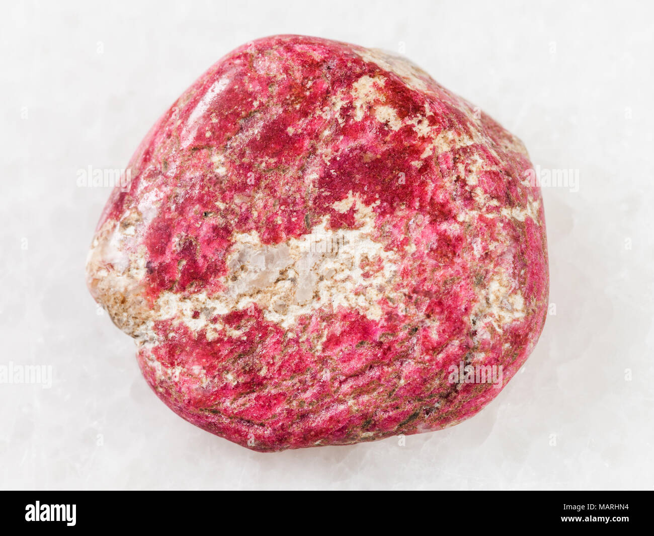 macro shooting of natural mineral rock specimen - polished Thulite ...