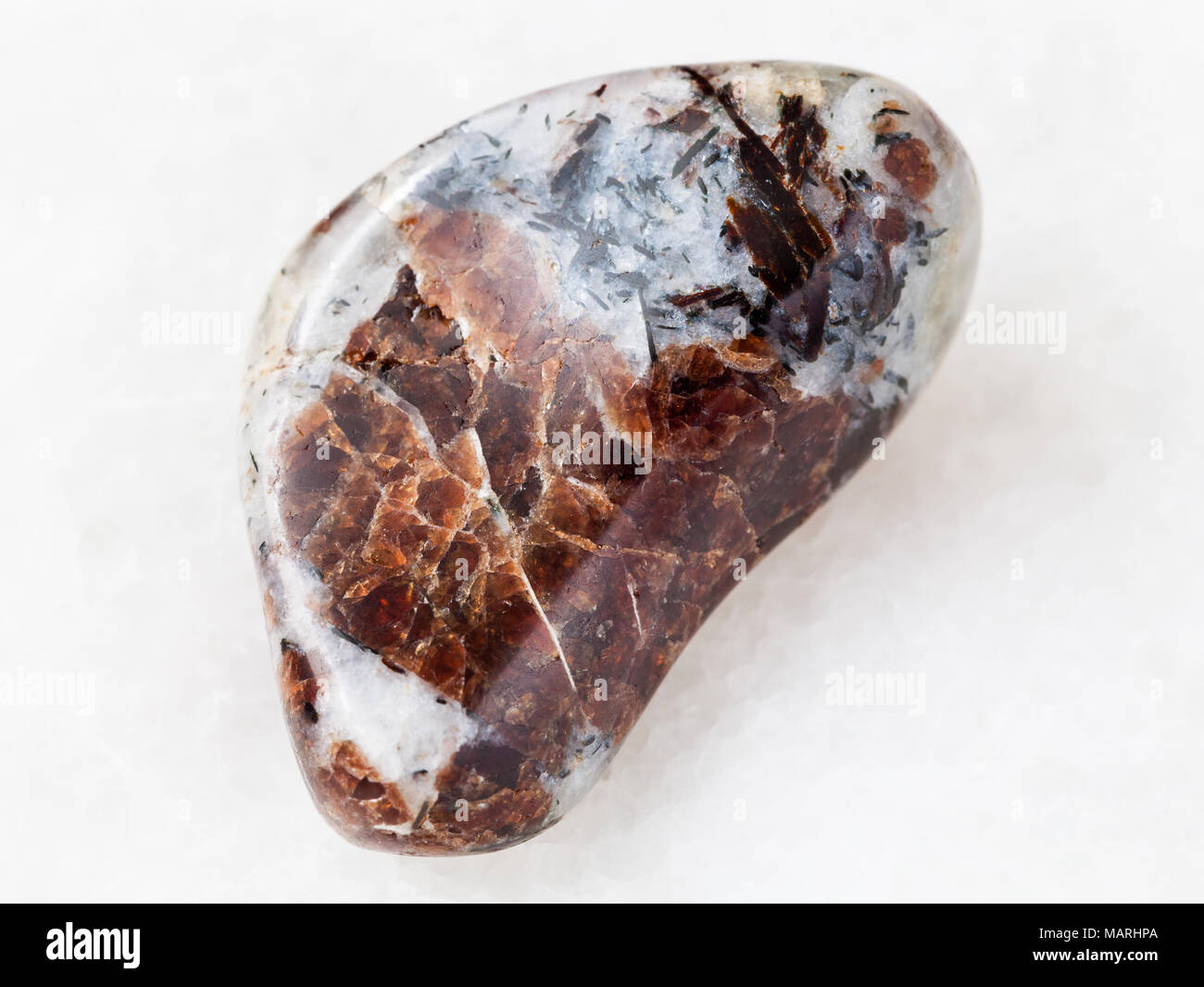 macro shooting of natural mineral rock specimen - polished Eudialyte in ...