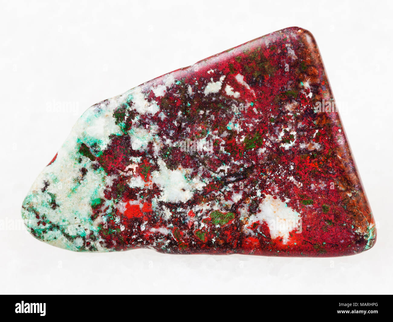 macro shooting of natural mineral rock specimen - tumbled red Cuprite ...