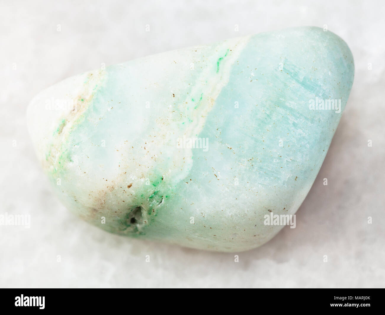 macro shooting of natural mineral rock specimen - polished green ...