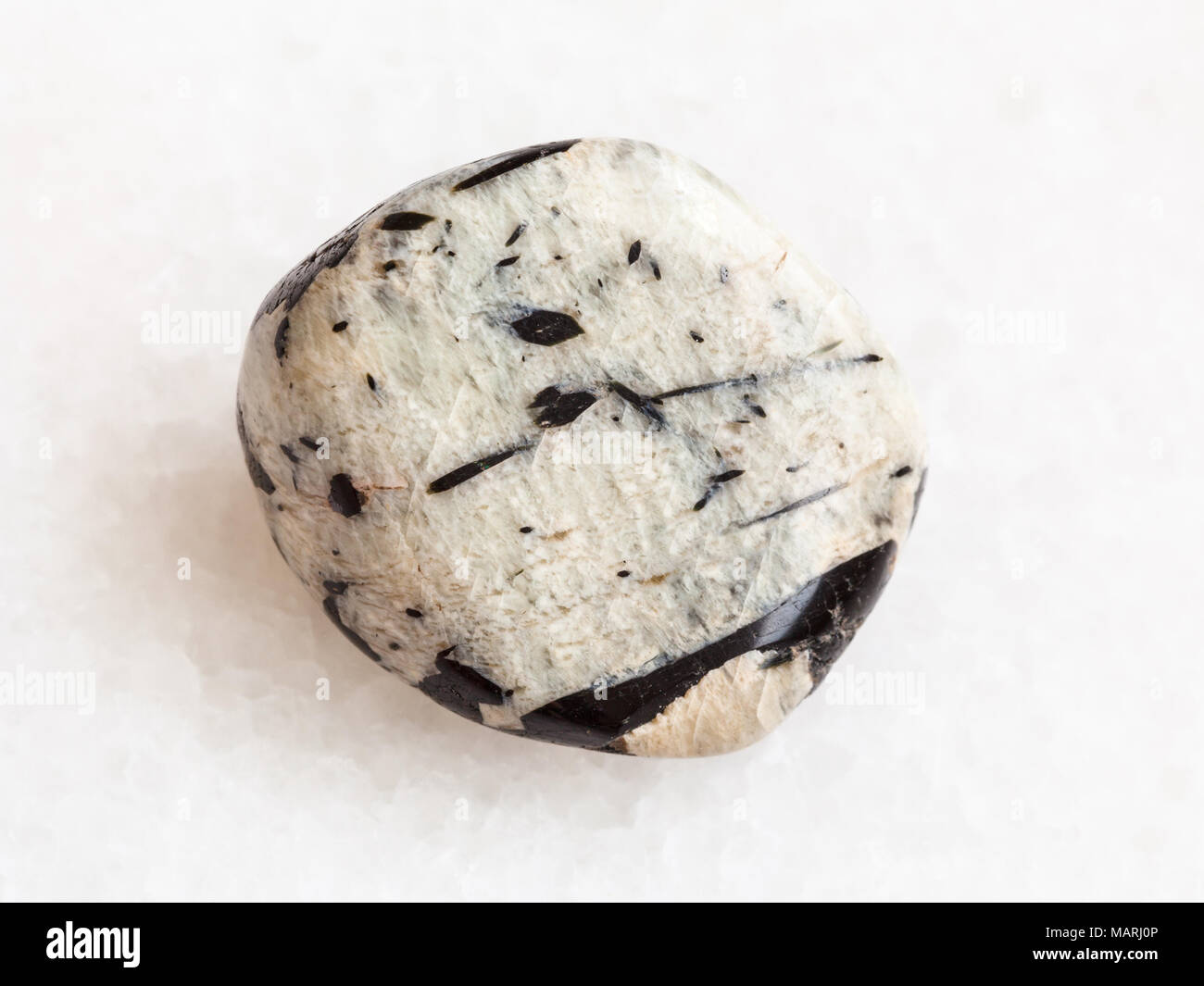 macro shooting of natural mineral rock specimen - black aegirine ...