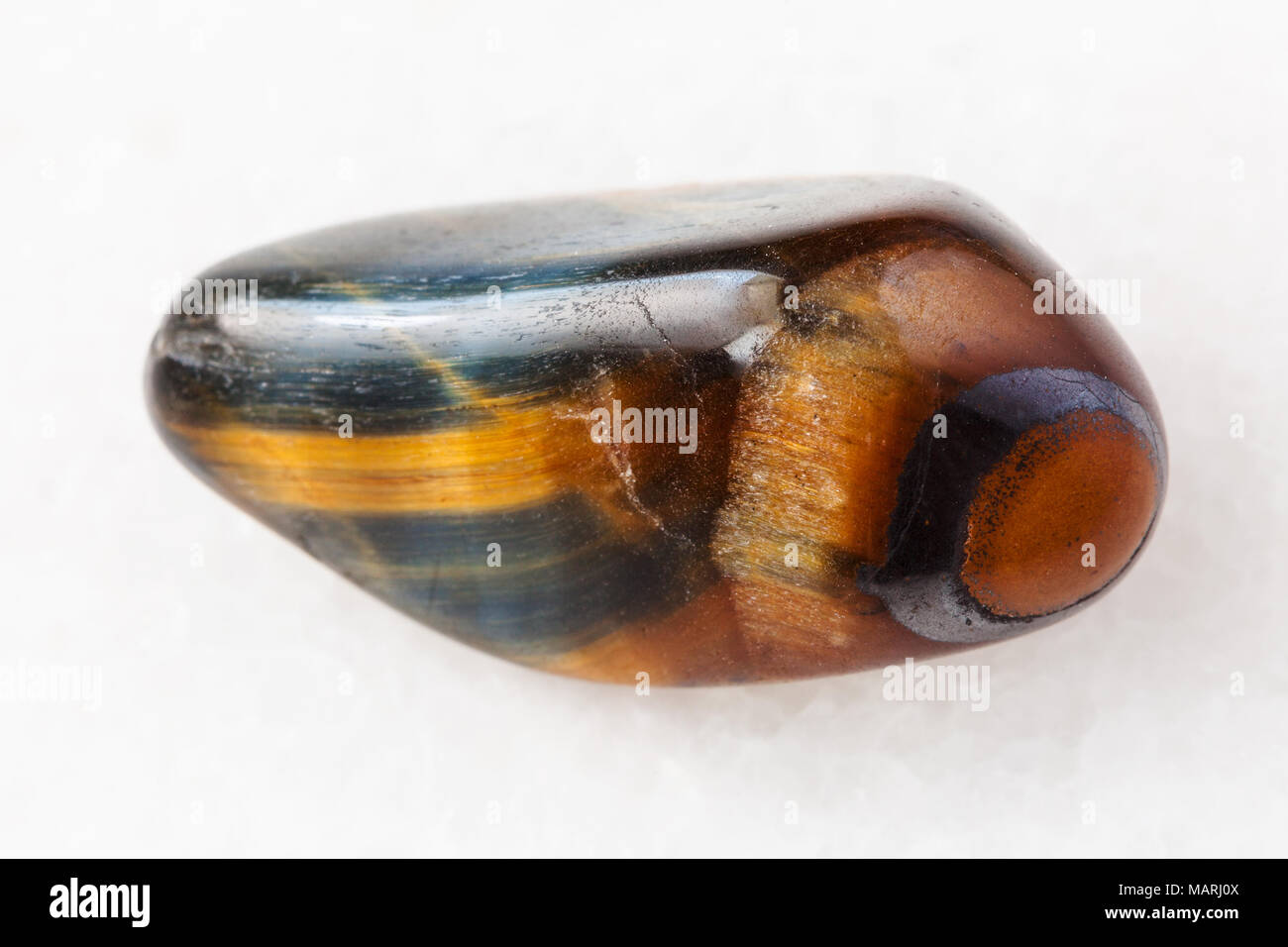 macro shooting of natural mineral rock specimen - tiger's eye and hawk ...