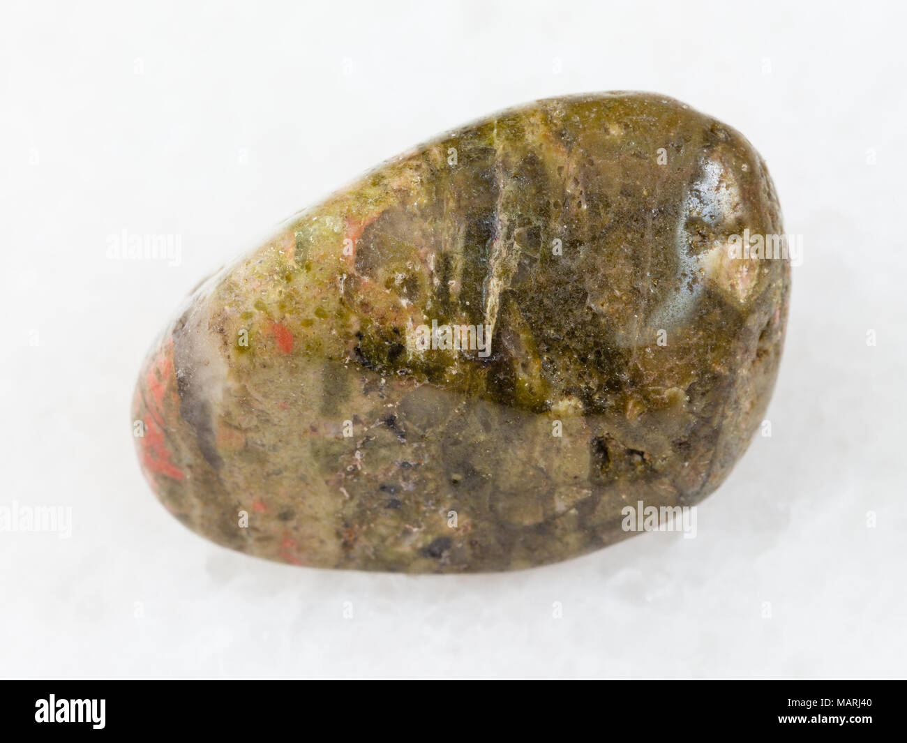 macro shooting of natural mineral rock specimen - polished unakite gem ...