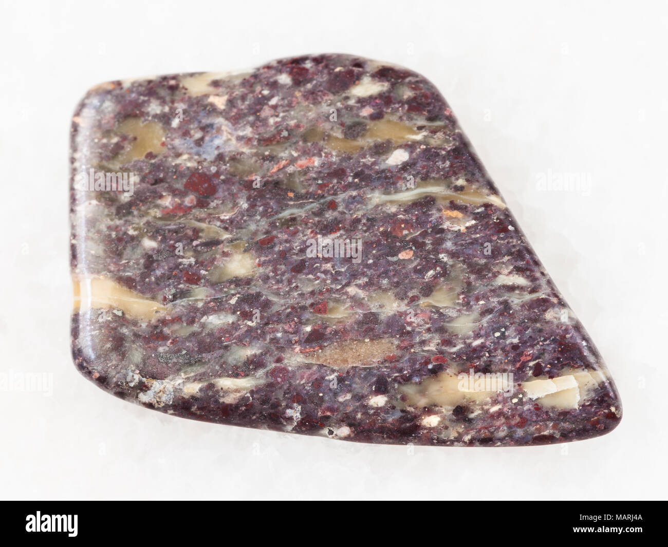 macro shooting of natural mineral rock specimen - polished Alunite ...