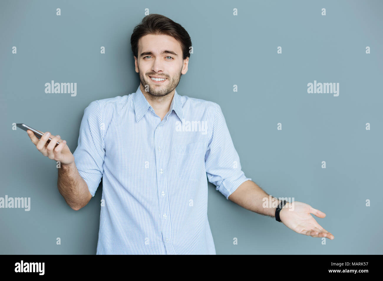Happy joyful man smiling to you Stock Photo - Alamy