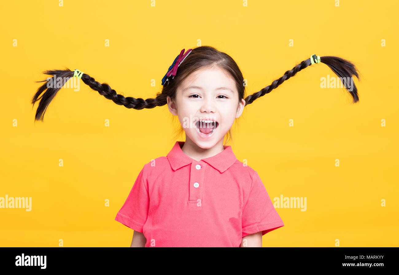 Closeup portrait of cute little girl having fun Stock Photo - Alamy