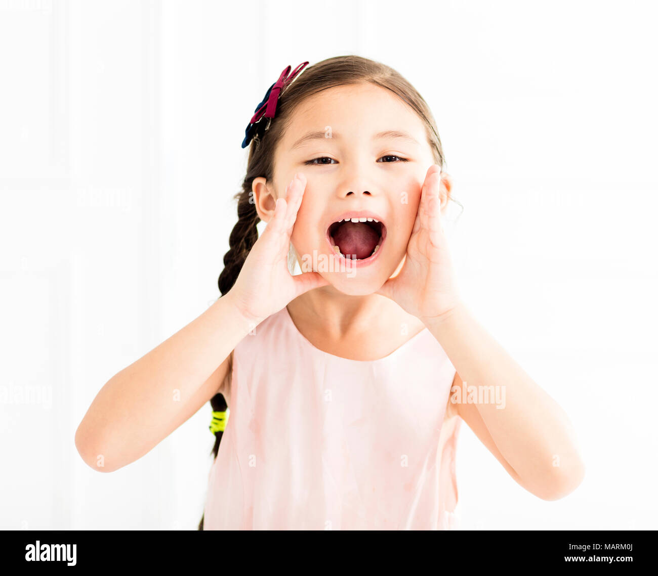 happy Little girl shouting Stock Photo - Alamy