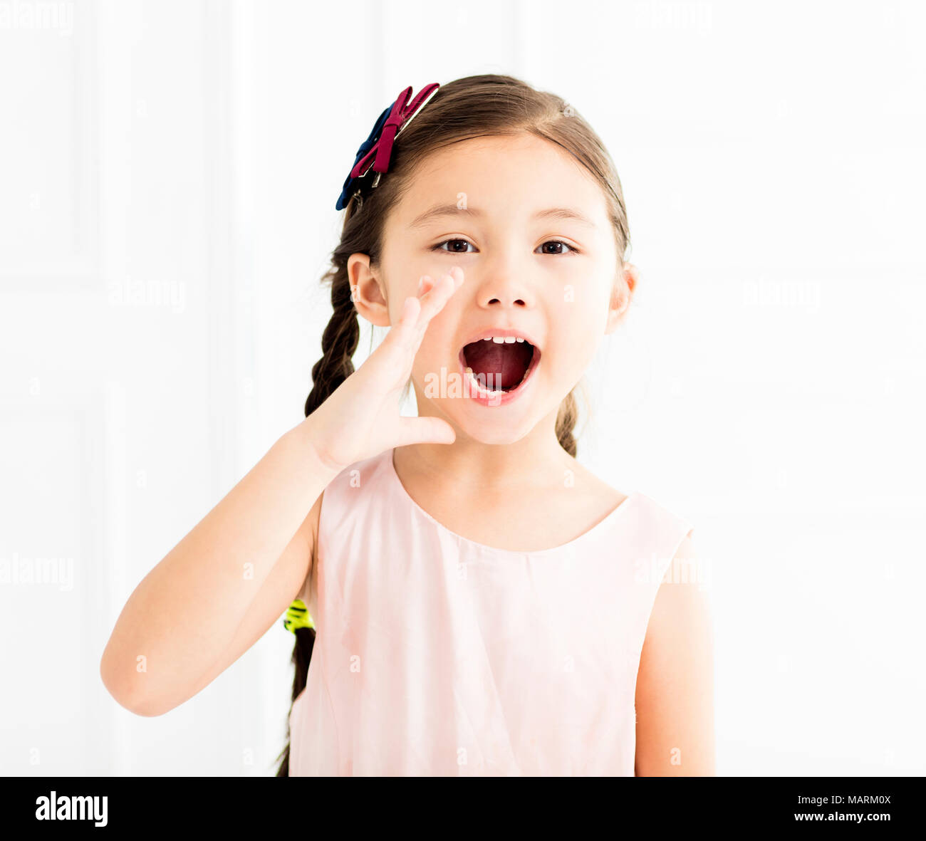 happy Little girl shouting Stock Photo - Alamy