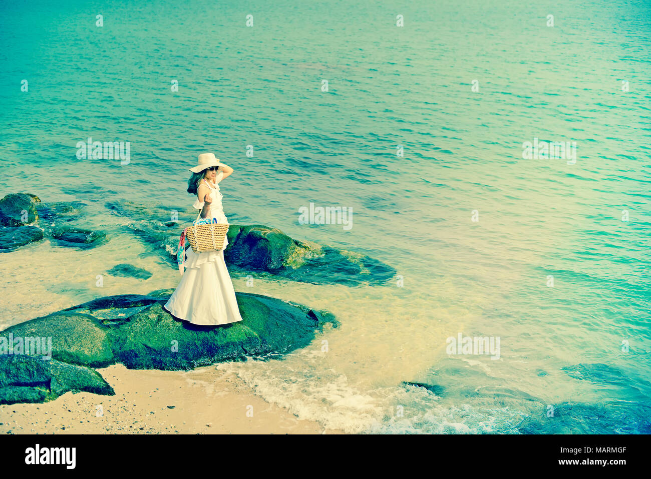 Woman alone sad beach summer back hi-res stock photography and images ...