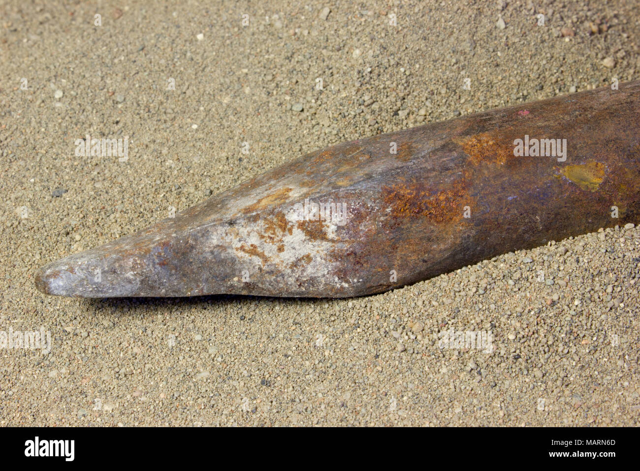 Old steel crowbar on the sand Stock Photo - Alamy