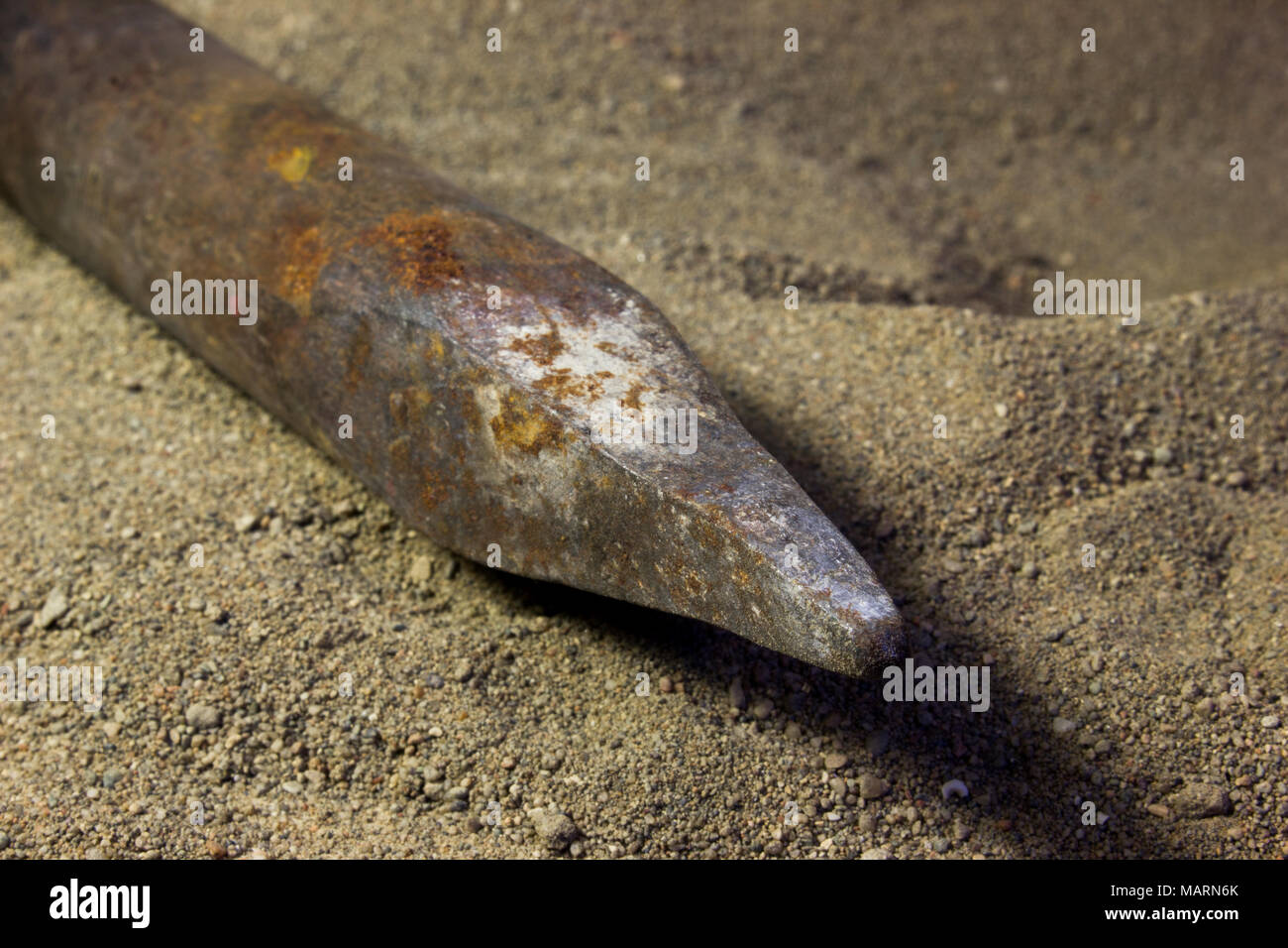 Old steel crowbar on the sand Stock Photo - Alamy
