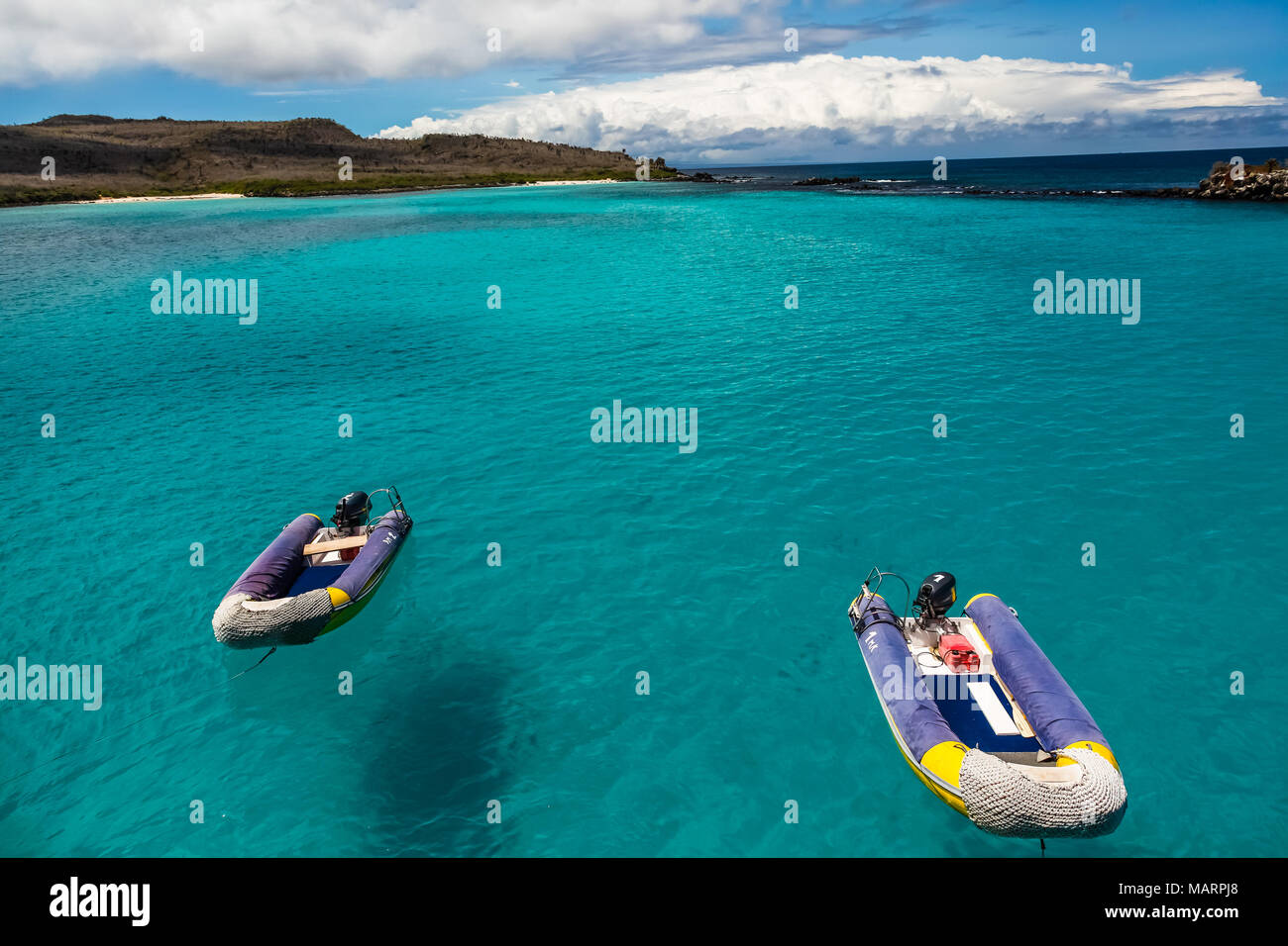 Inflatable rubber boats with motor in the turquoise crystal clear water ...