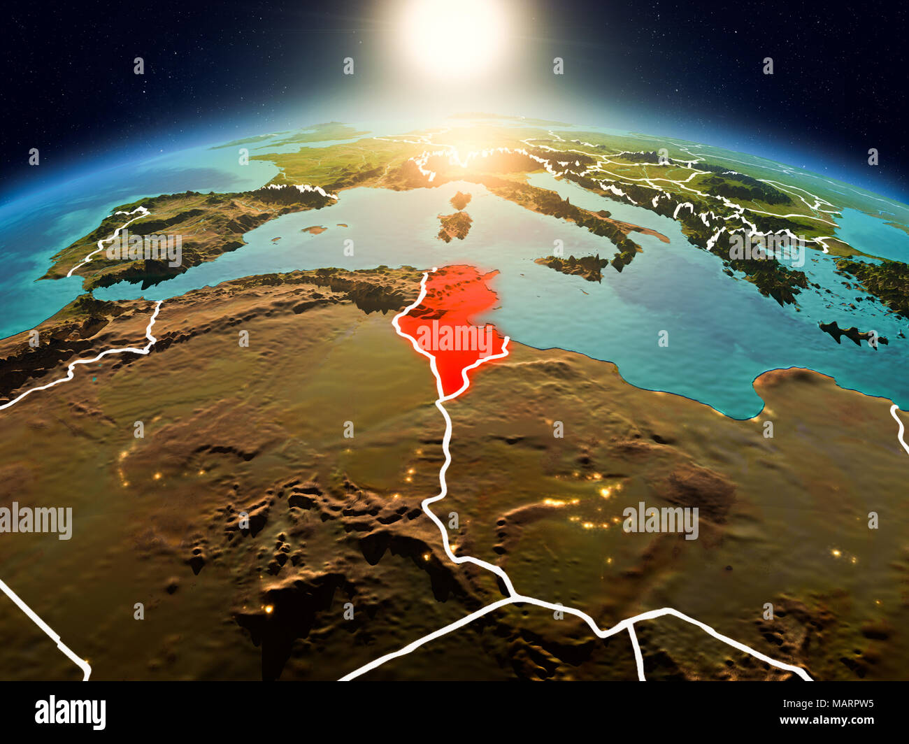 Sunrise above Tunisia highlighted in red on model of planet Earth in space with visible country ...
