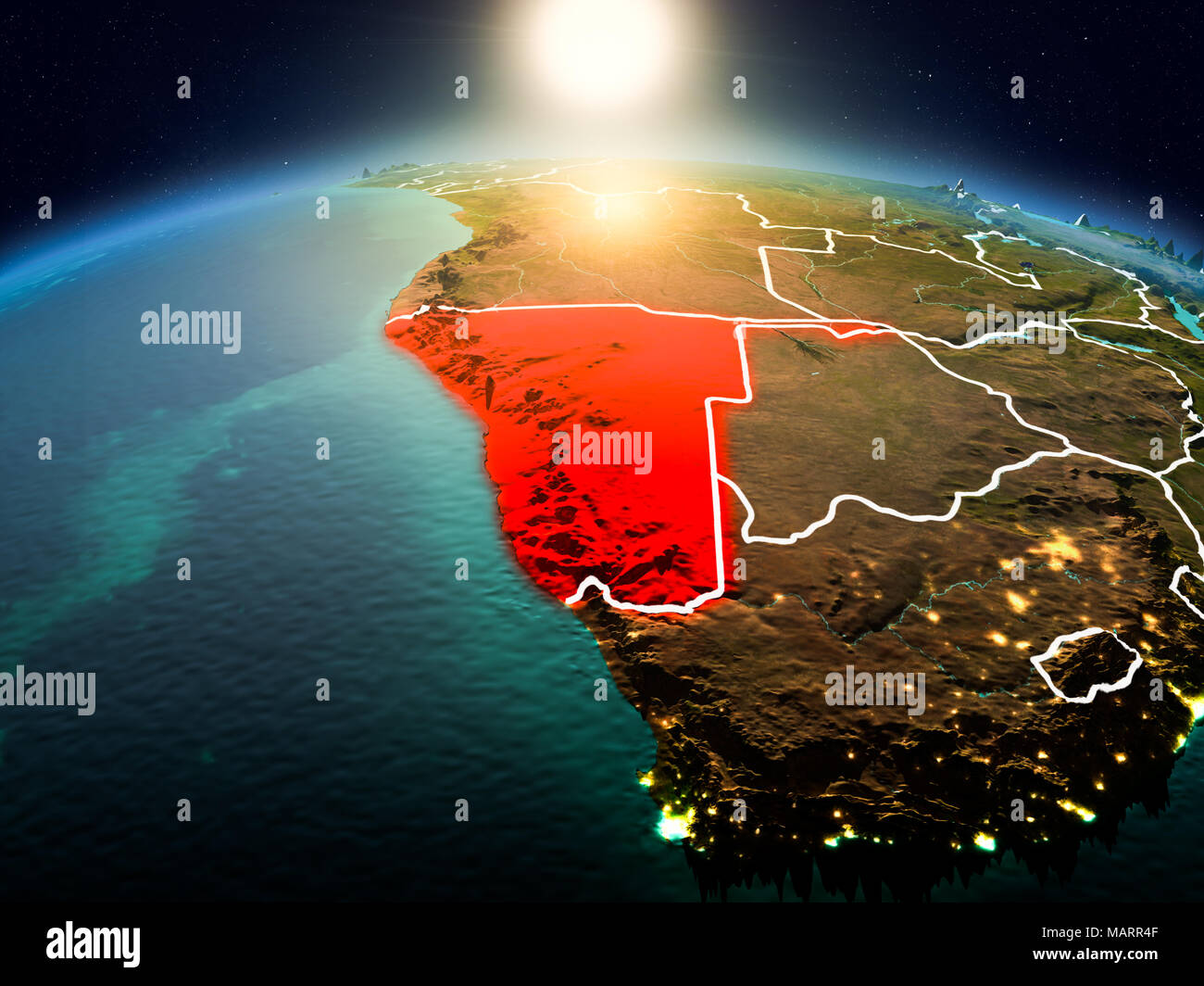 Sunrise above Namibia highlighted in red on model of planet Earth in space with visible country ...