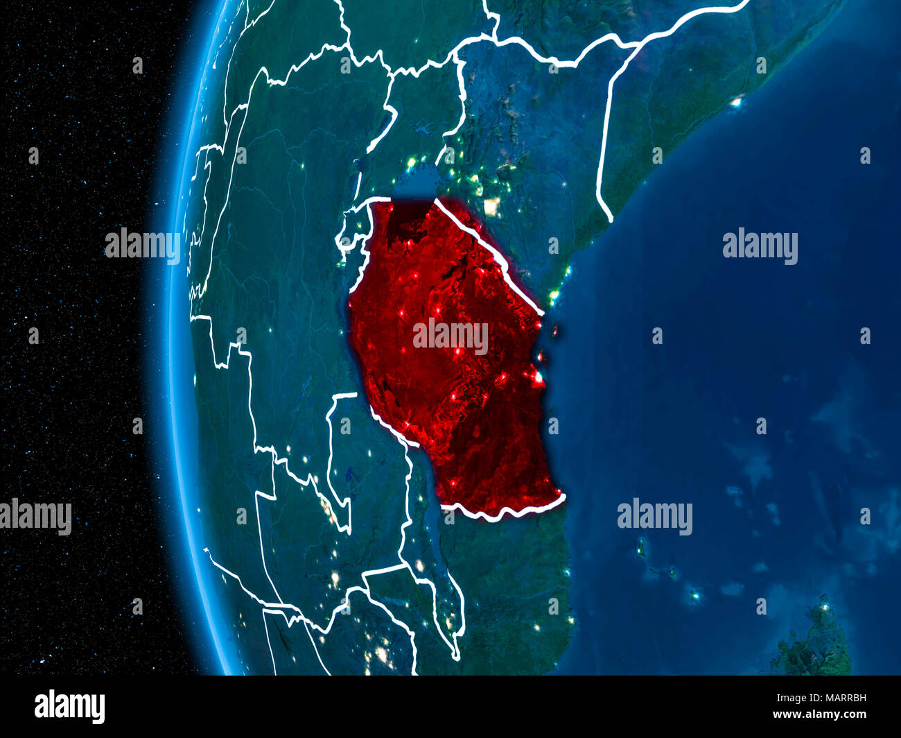 Space orbit view of Tanzania highlighted in red on planet Earth at night with visible country ...