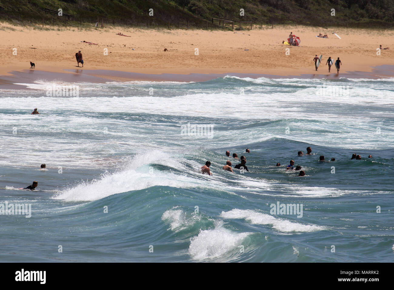 Holiday makers enjoy the beaches of Australia, cooling down in the ...