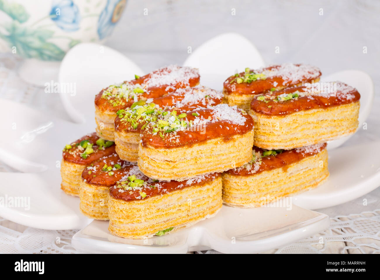 Group of Light Crunchy Puff Layered Pastry Garnished With Pistachios ...