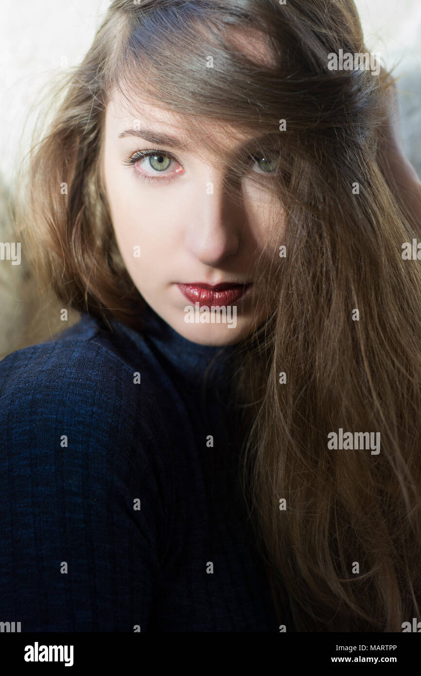 Portrait of a serious beautiful woman Stock Photo - Alamy