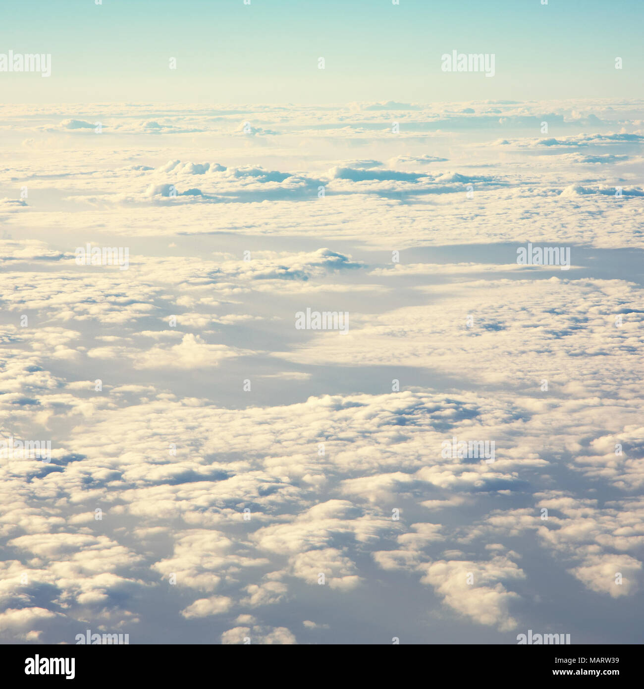 sky view from an airplane above the clouds Stock Photo - Alamy