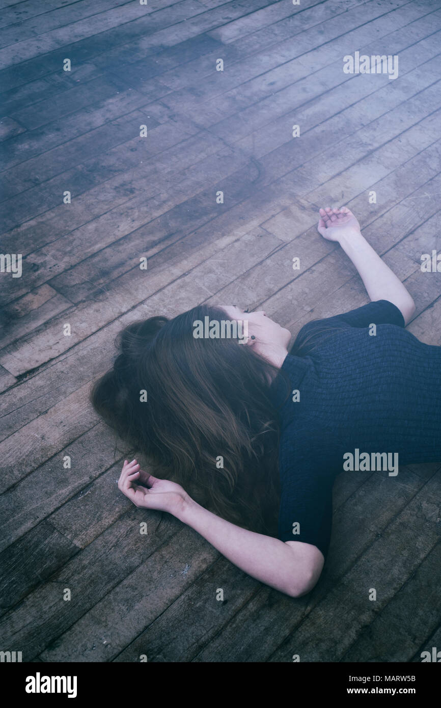 Dead woman lying on floor hi-res stock photography and images - Alamy