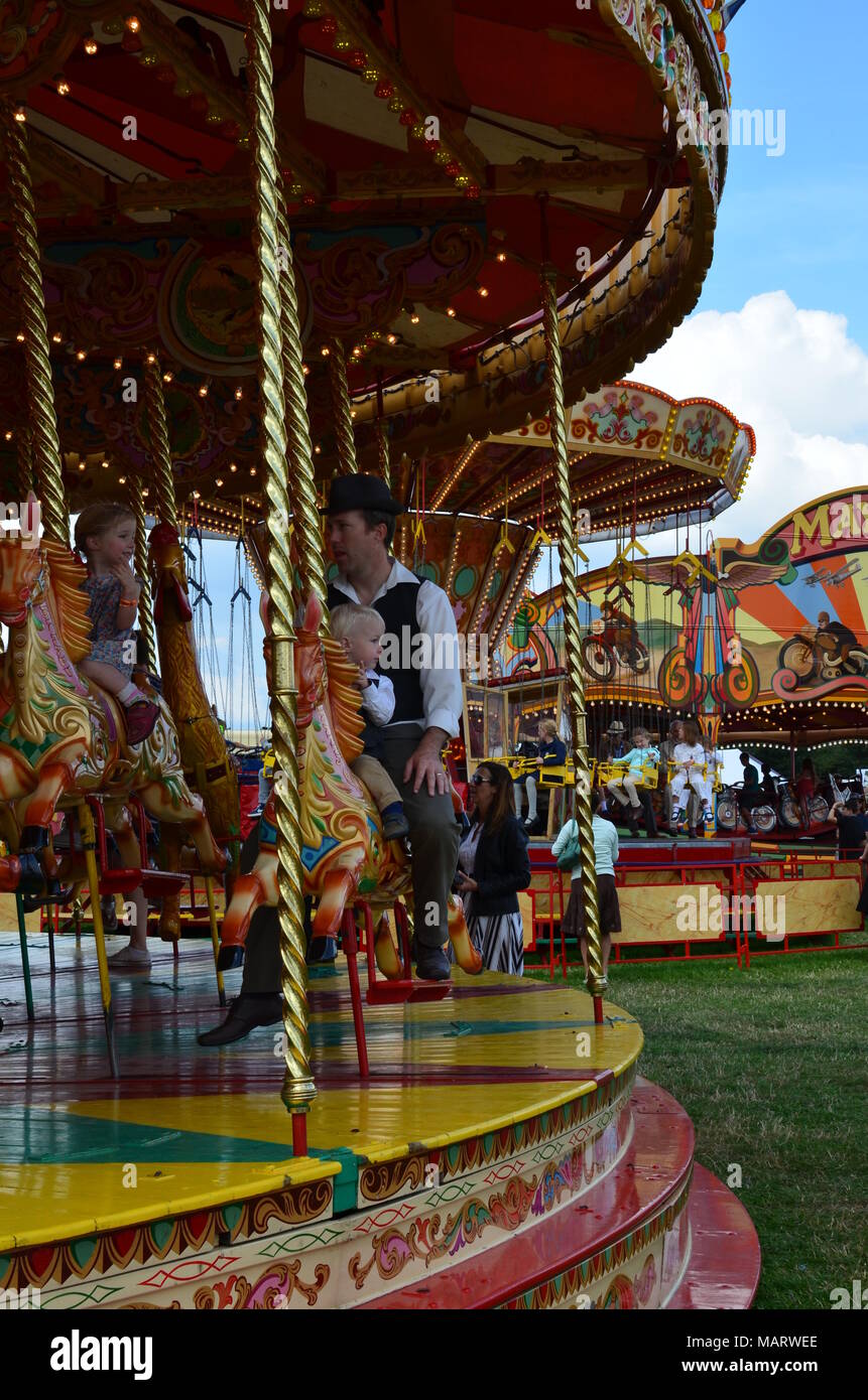 Vintage Fairground Carousel at the 2014 Goodwood Revival event held at ...