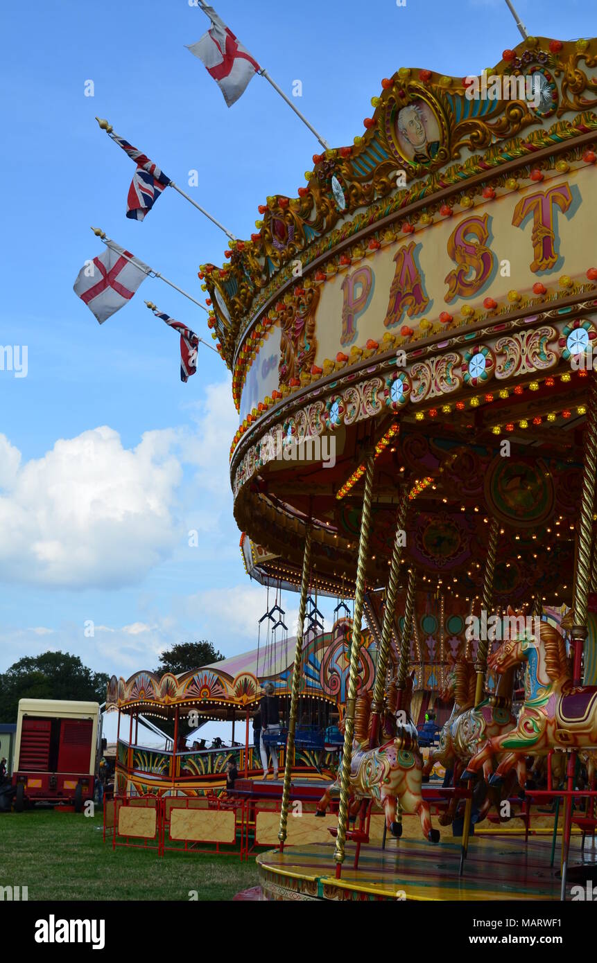 Vintage Fairground Carousel at the 2014 Goodwood Revival event held at ...