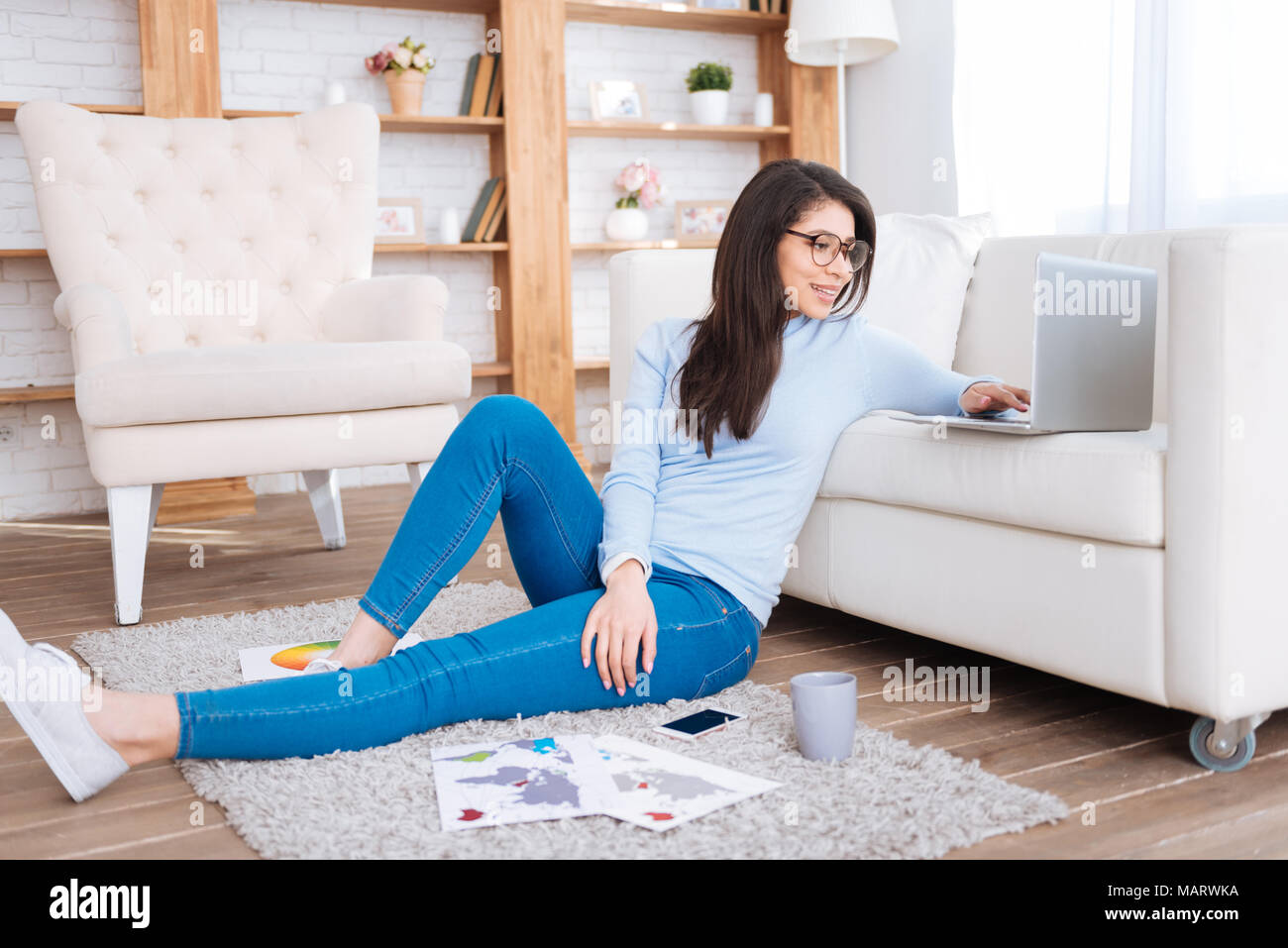 Enthusiastic female student overloading with task Stock Photo - Alamy