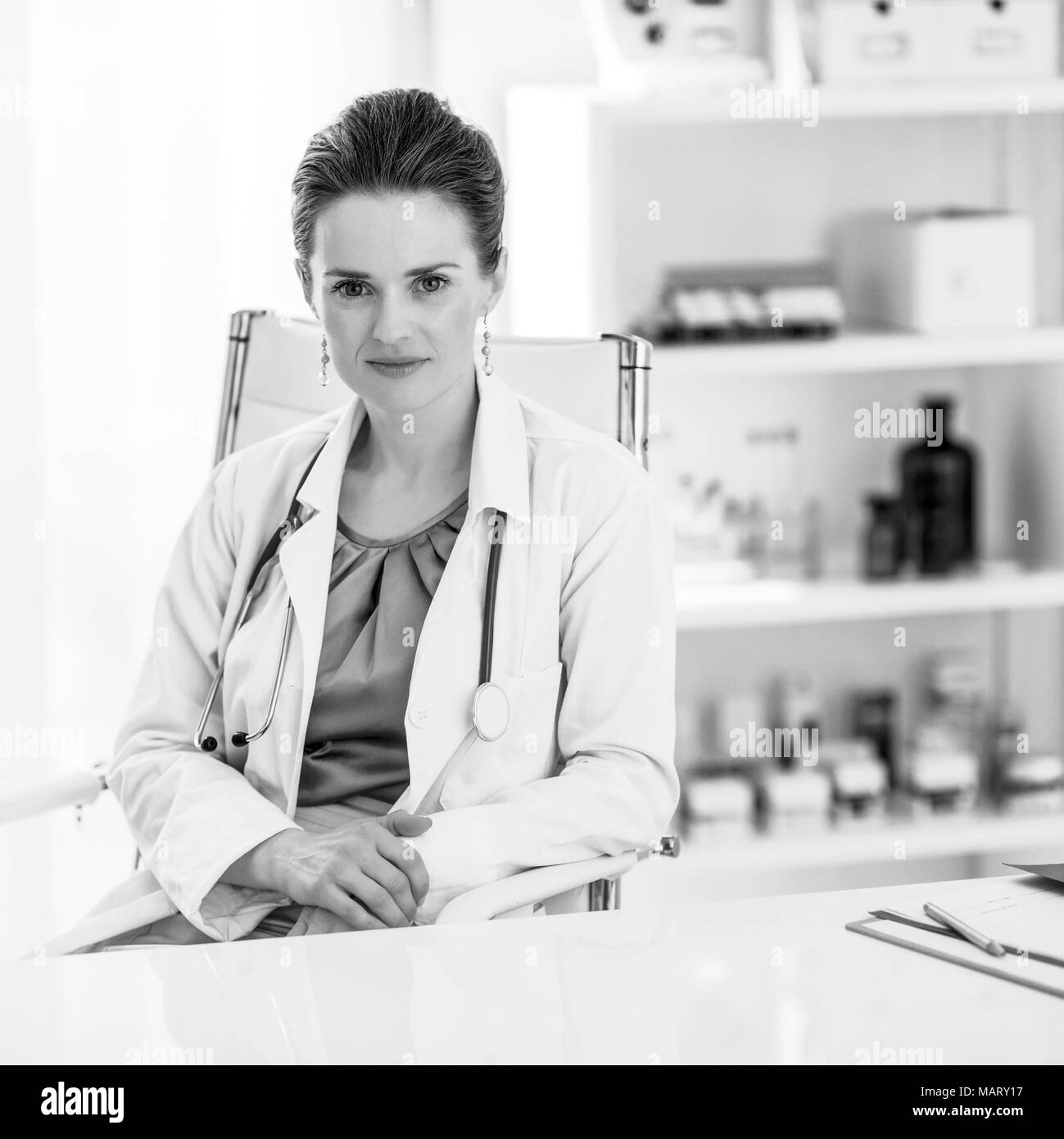 Office professional woman sitting Black and White Stock Photos & Images ...